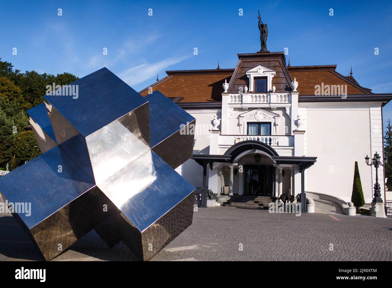 Great large house with statue and sculpture Stock Photo - Alamy