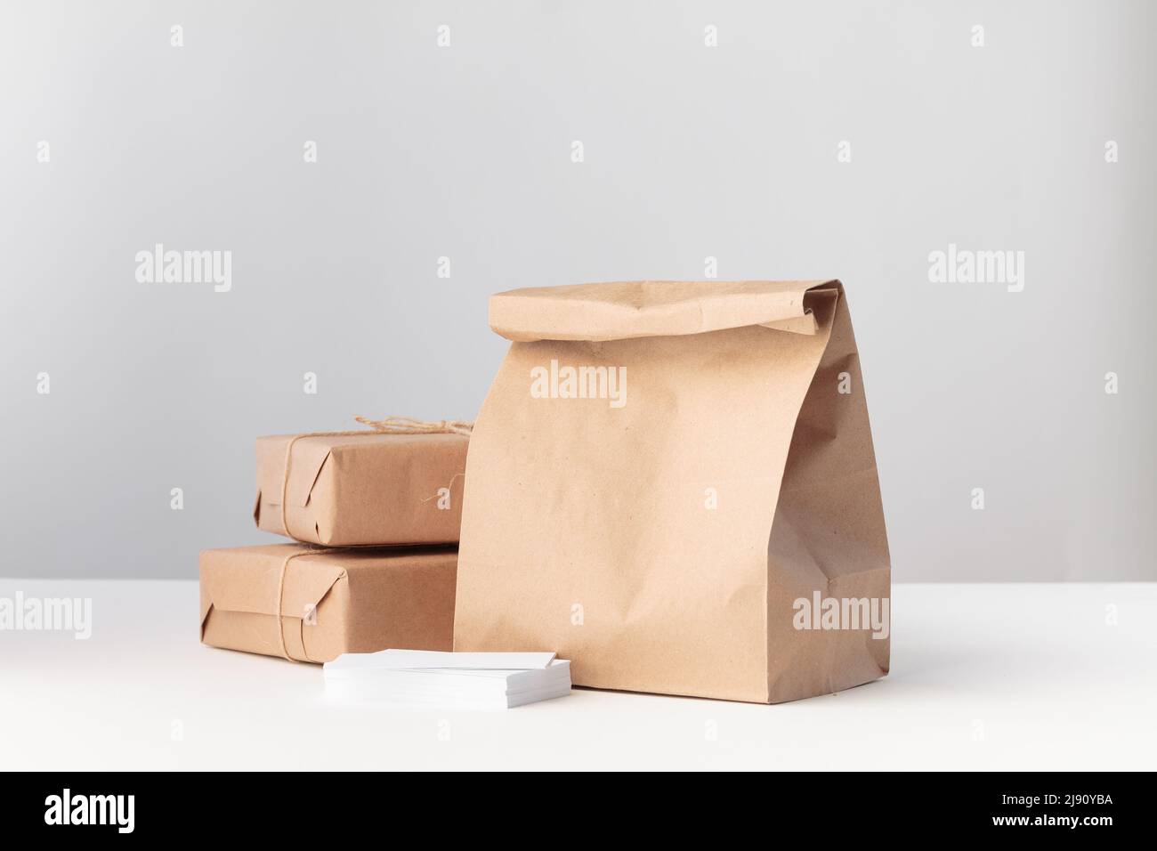 packaging set of craft boxes and a paper bag on a white background ...