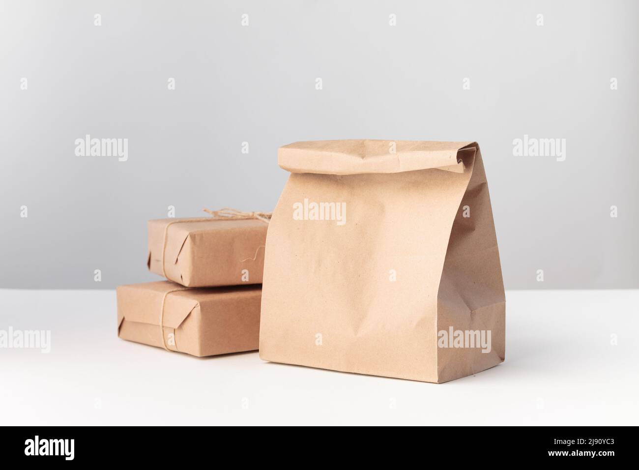 packaging set of craft boxes and a paper bag on a white background ...