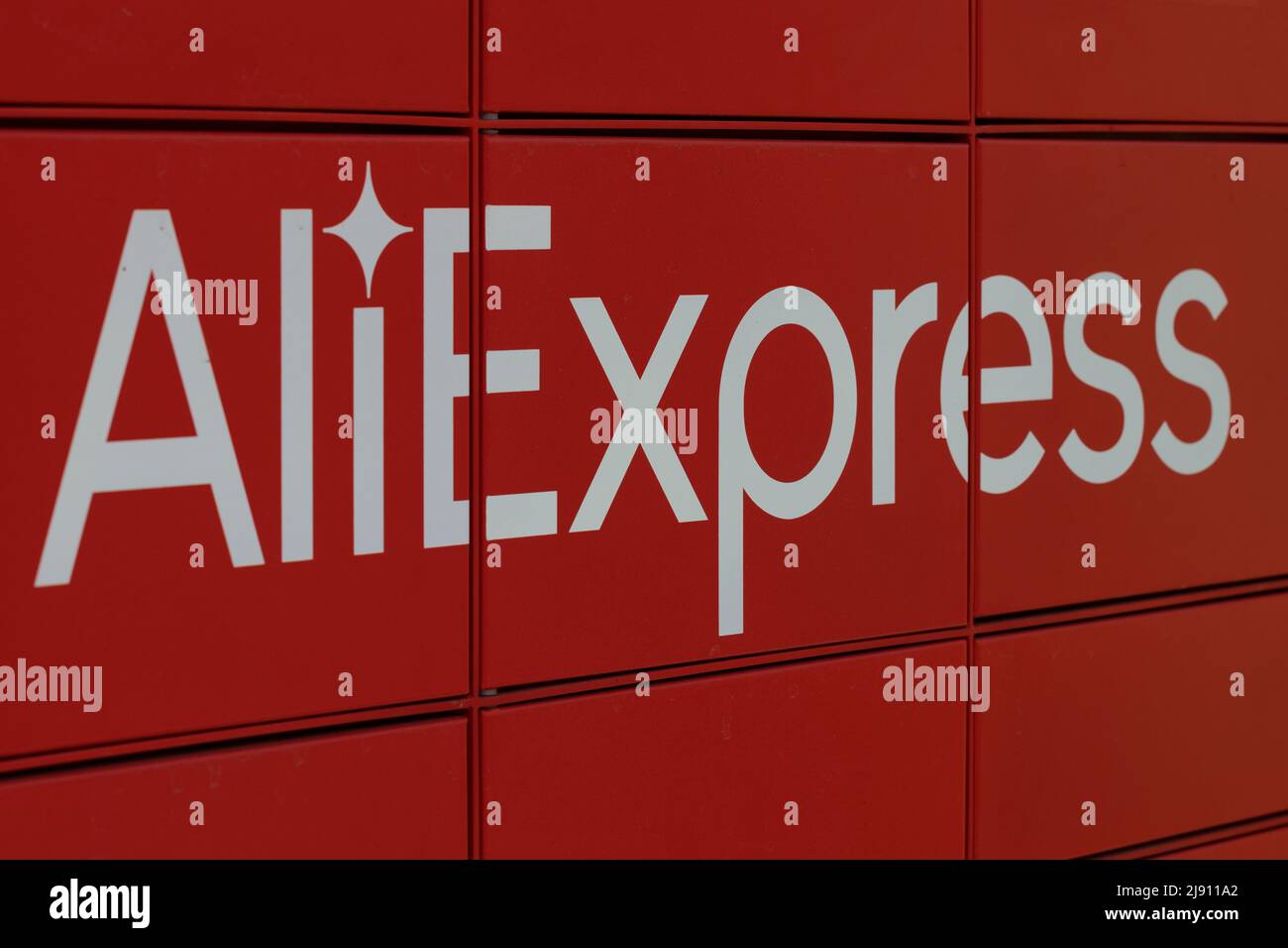 Poznan, Poland. 19 May 2022: Close-u sign AliExpress red locker, called ...