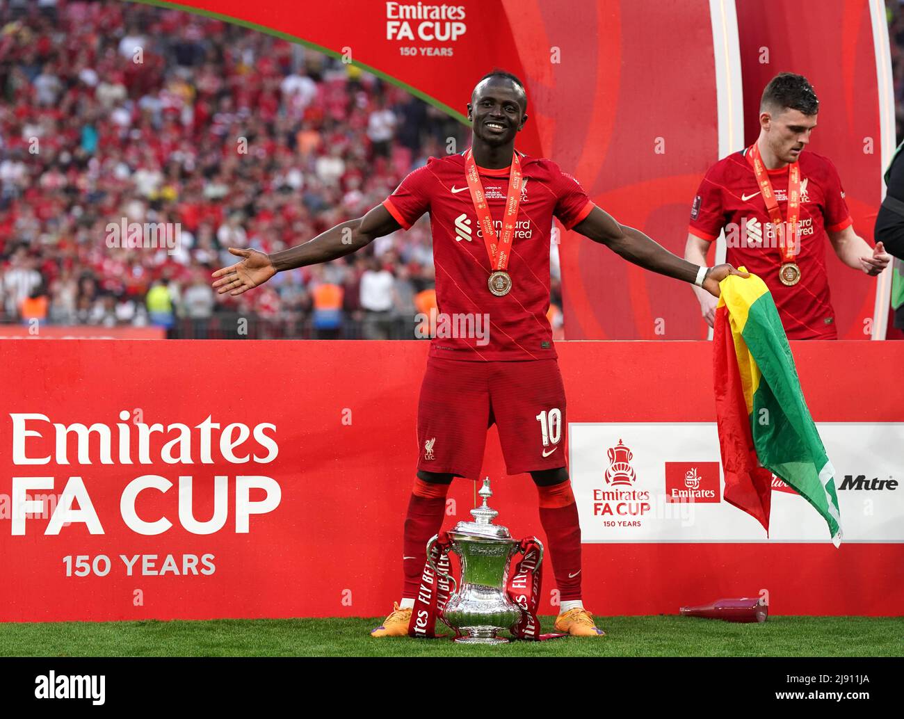 Liverpool's Sadio Mane celebrates with the trophy following the ...