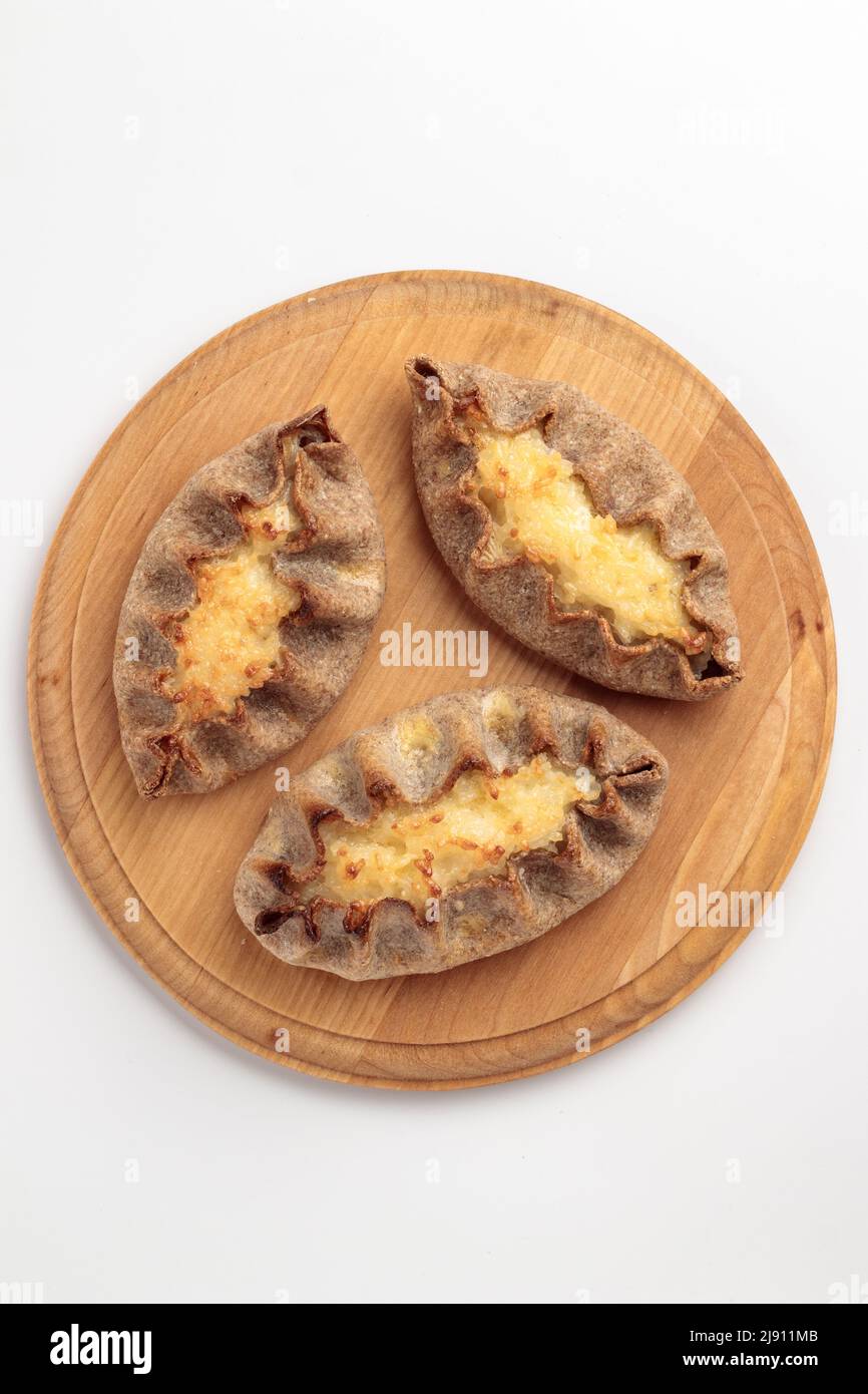 Traditional Finnish pastry - Karelian rye pie with rice porridge and on ...