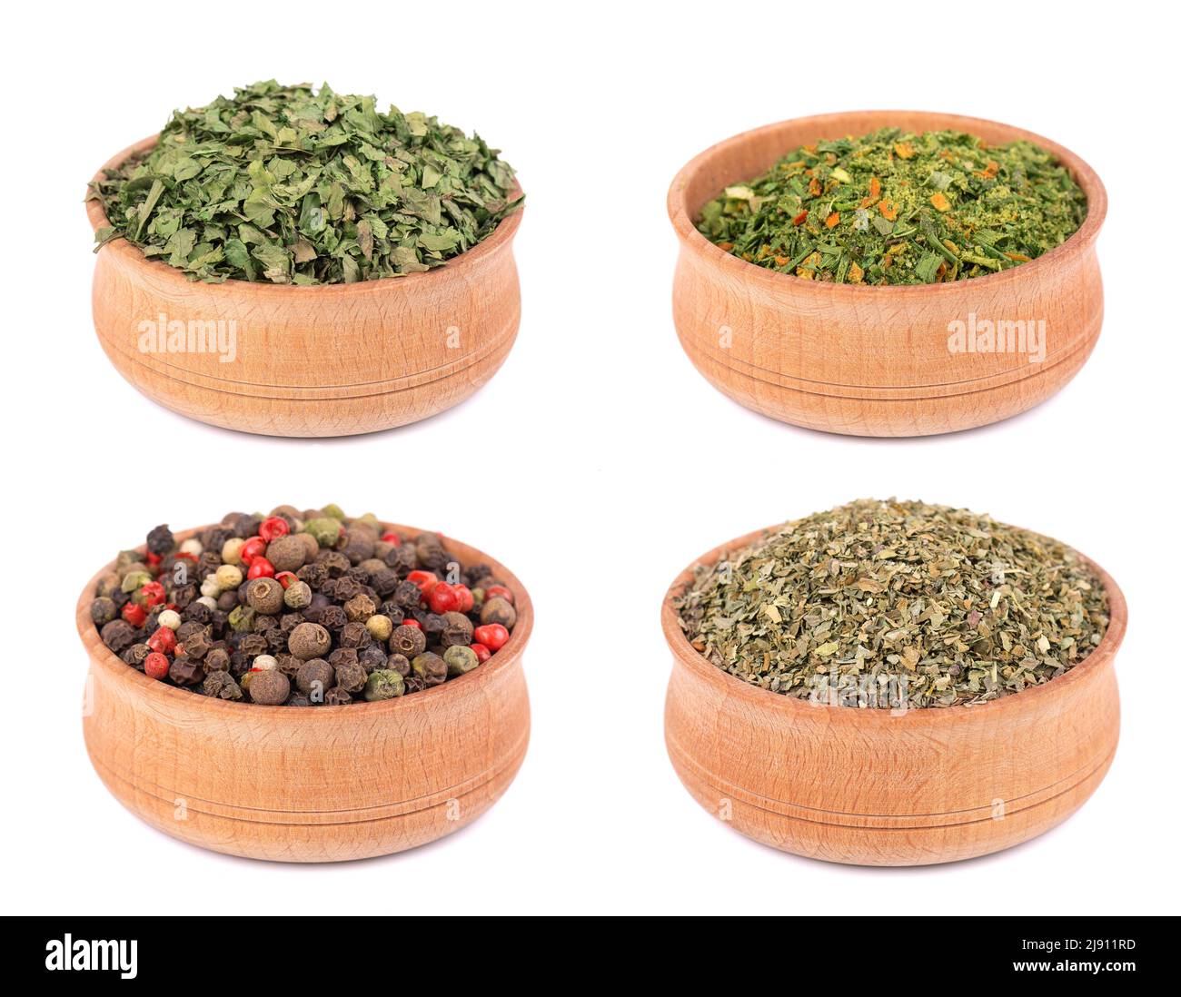 Mix of spices and seasonings isolated in wooden bowl, isolated on white ...