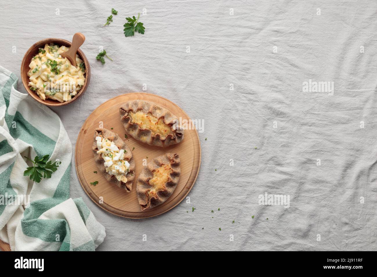 Traditional Finnish pastry - Karelian rye pie with rice porridge and an ...