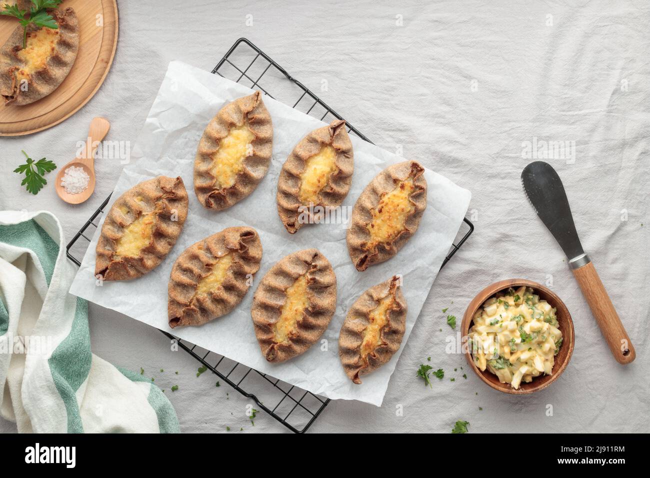 Traditional Finnish pastry - Karelian rye pie with rice porridge and an ...