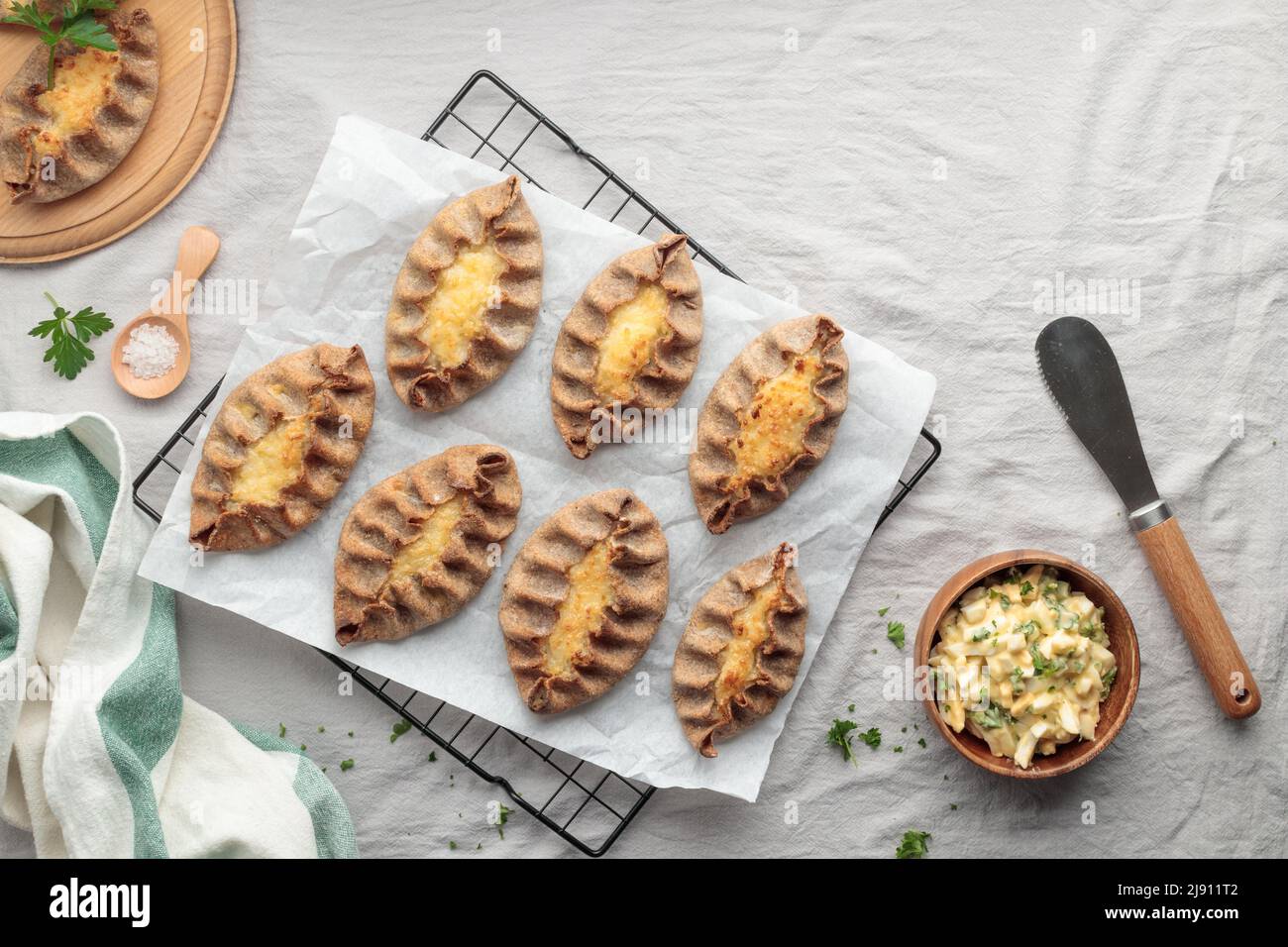 Traditional Finnish pastry - Karelian rye pie with rice porridge and an ...