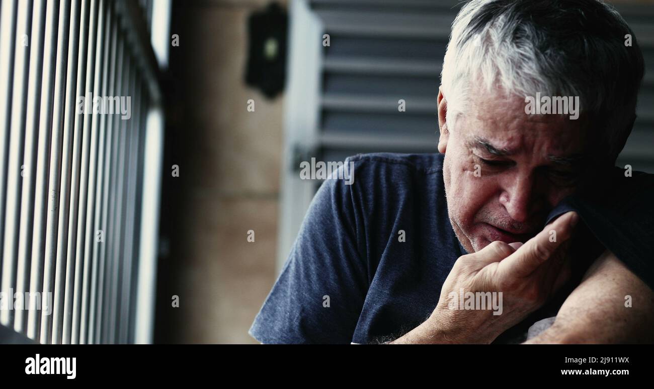 Desperate old man crying. Senior wiping tears in crisis Stock Photo - Alamy