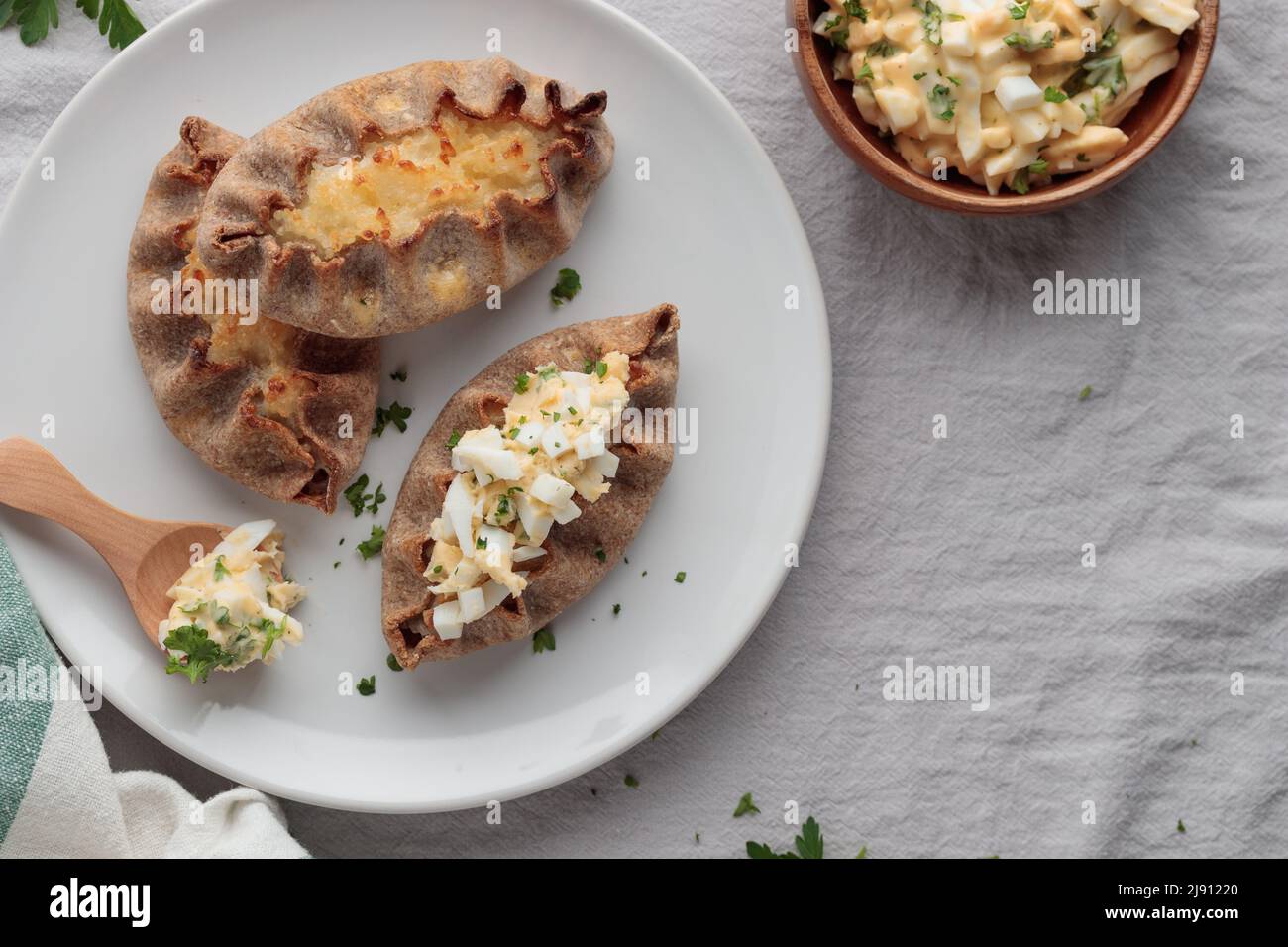 Traditional Finnish pastry - Karelian rye pie with rice porridge and an ...
