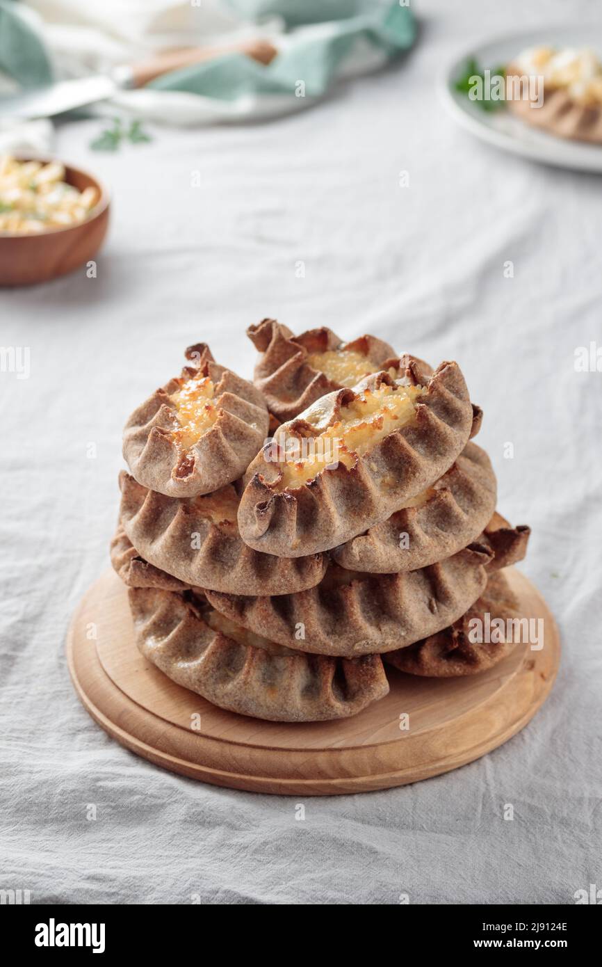 Traditional Finnish pastry - Karelian rye pie with rice porridge and an ...