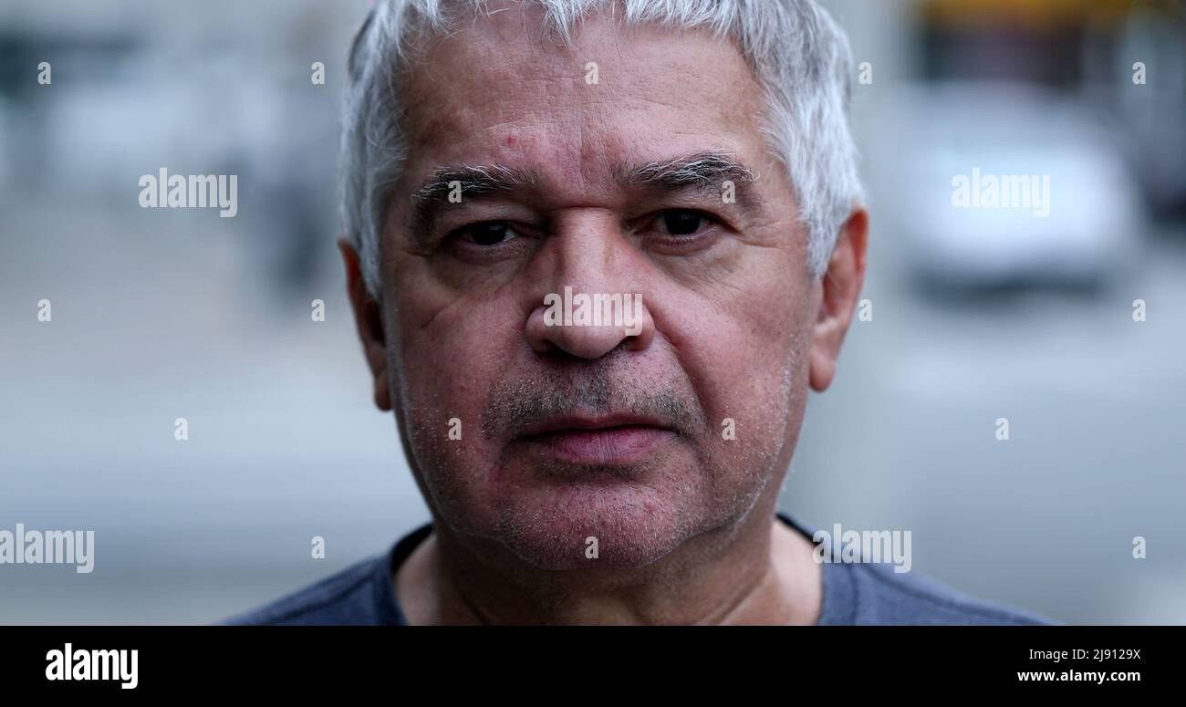 Middle aged old man face looks up with gratitude Stock Photo - Alamy