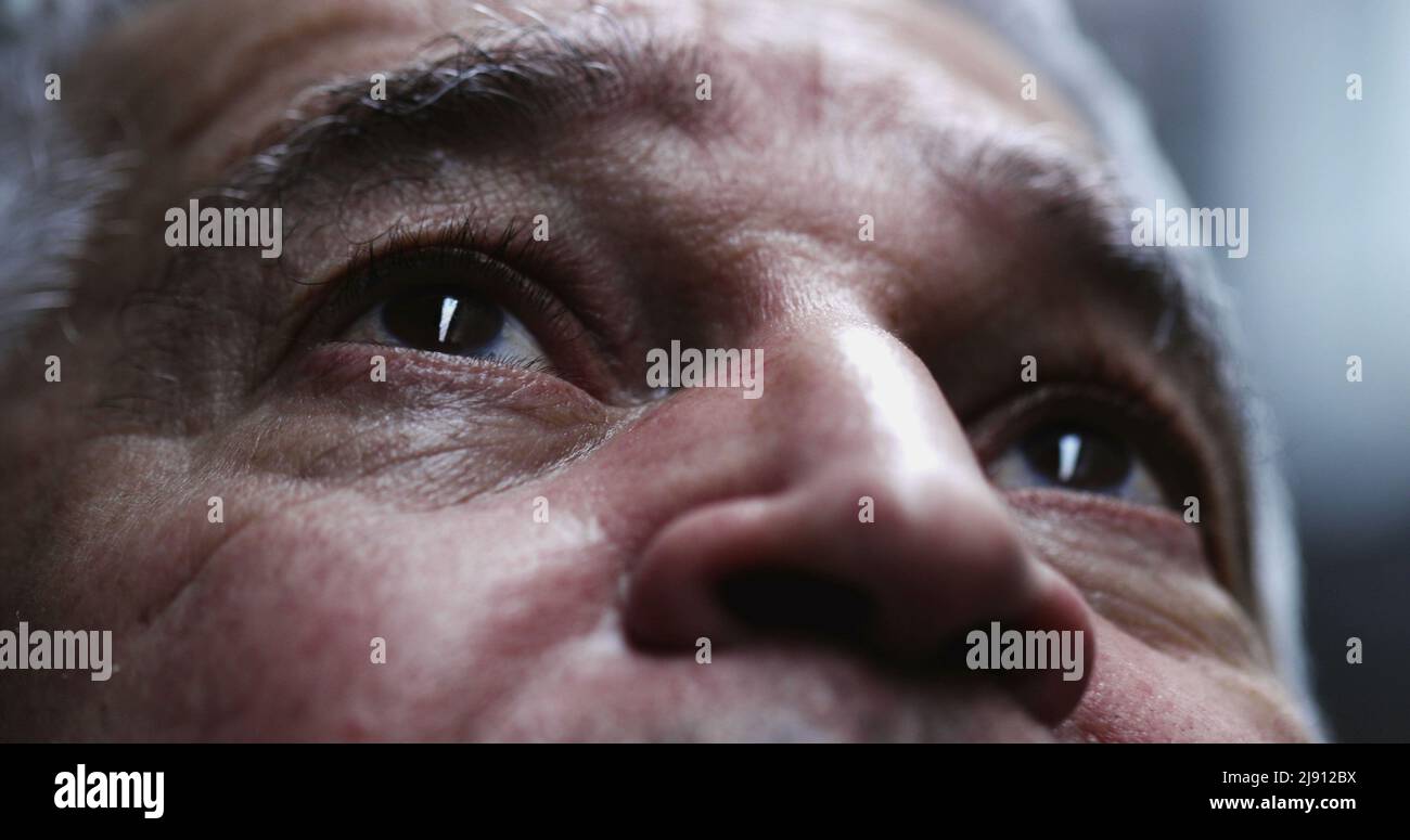 Old man eyes looking at sky with HOPE and FAITH Stock Photo - Alamy