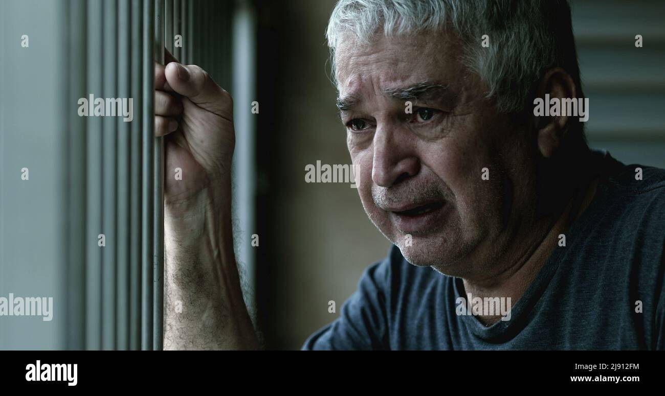 Old man in psychological mental pain. Stressed worried senior crying ...