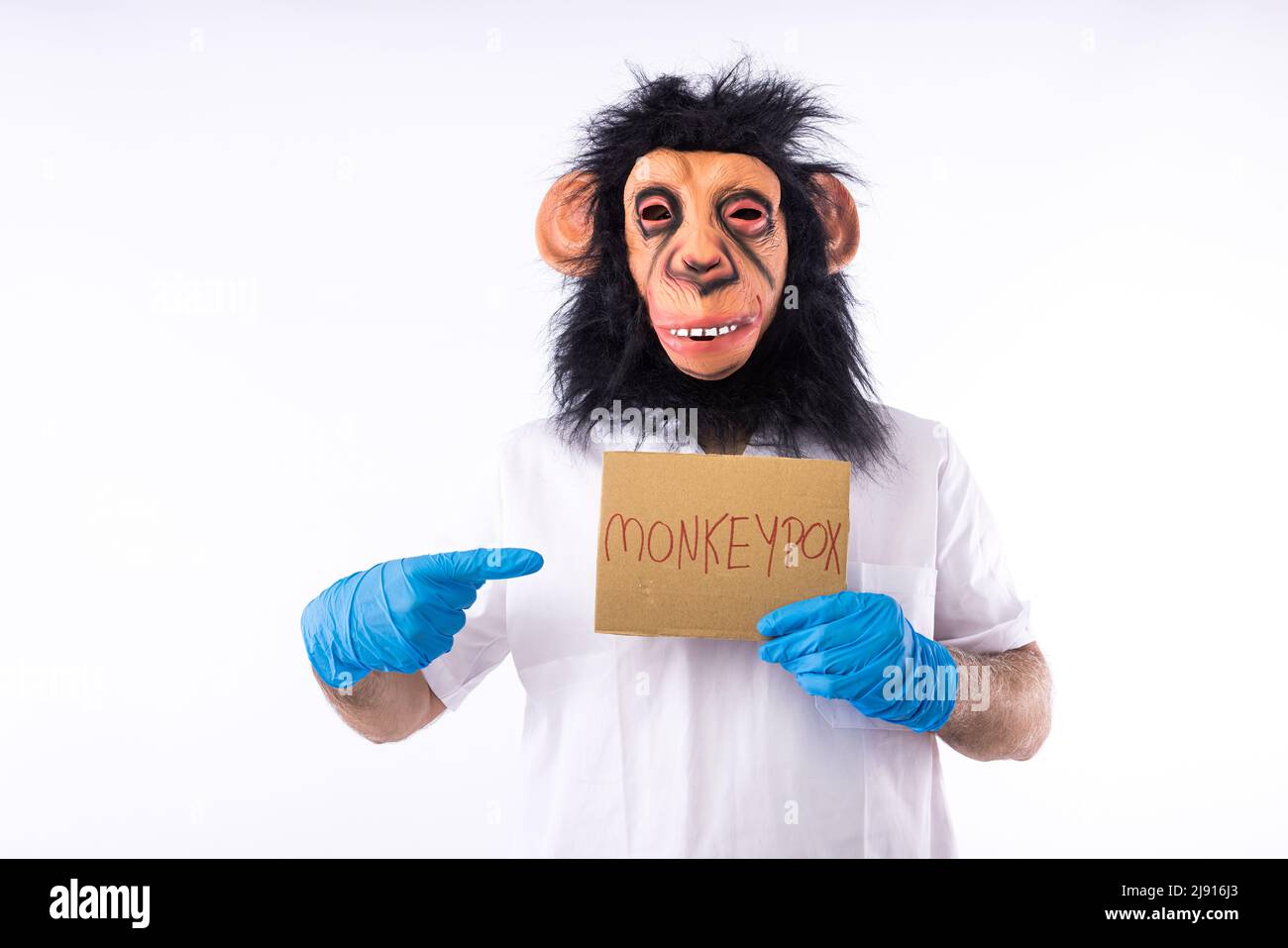 Person dressed as a monkey with a mask, wearing a medical nurse outfit ...