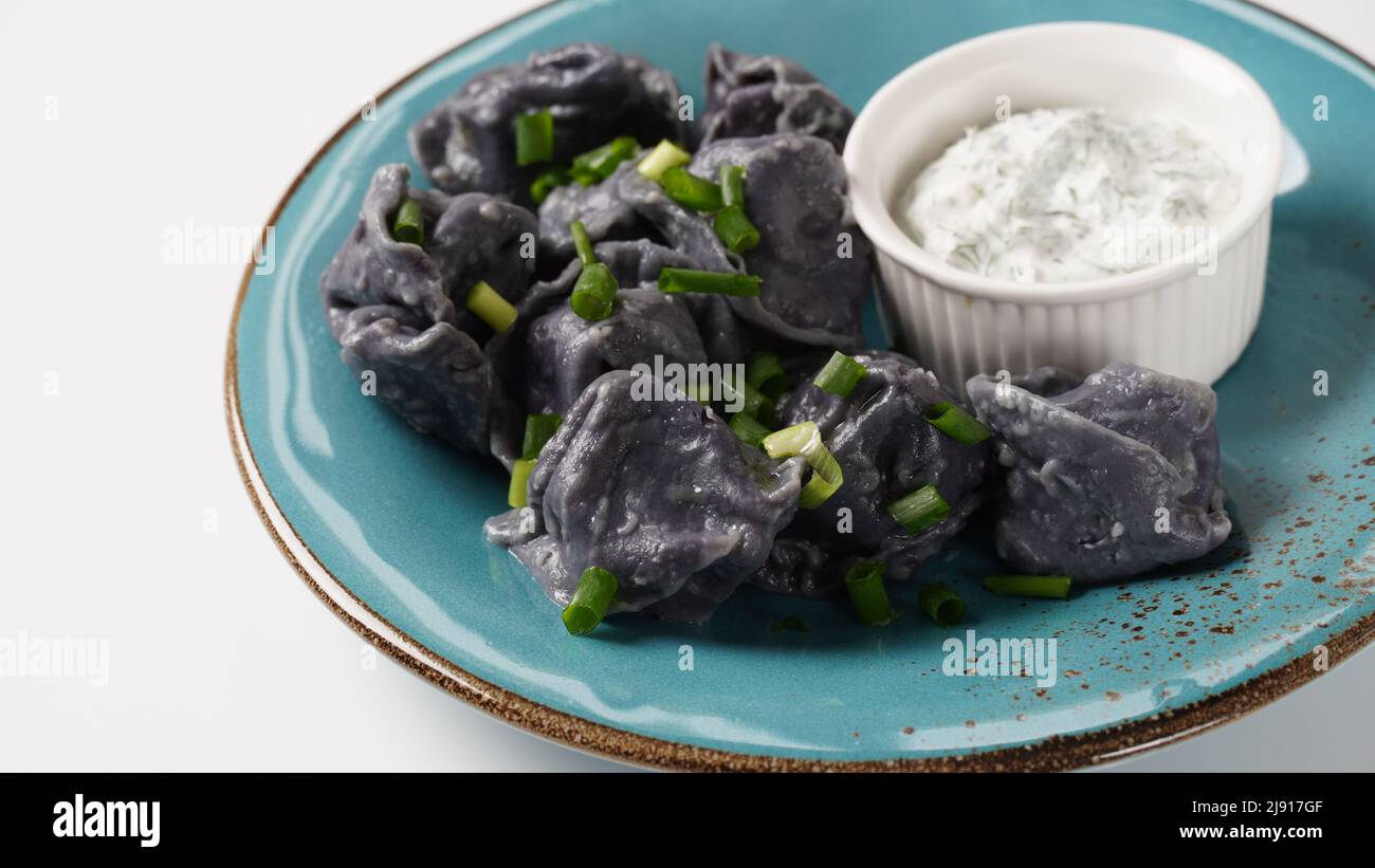 Colorful dumplings stuffed with meat. Colorful dumplings are a ...