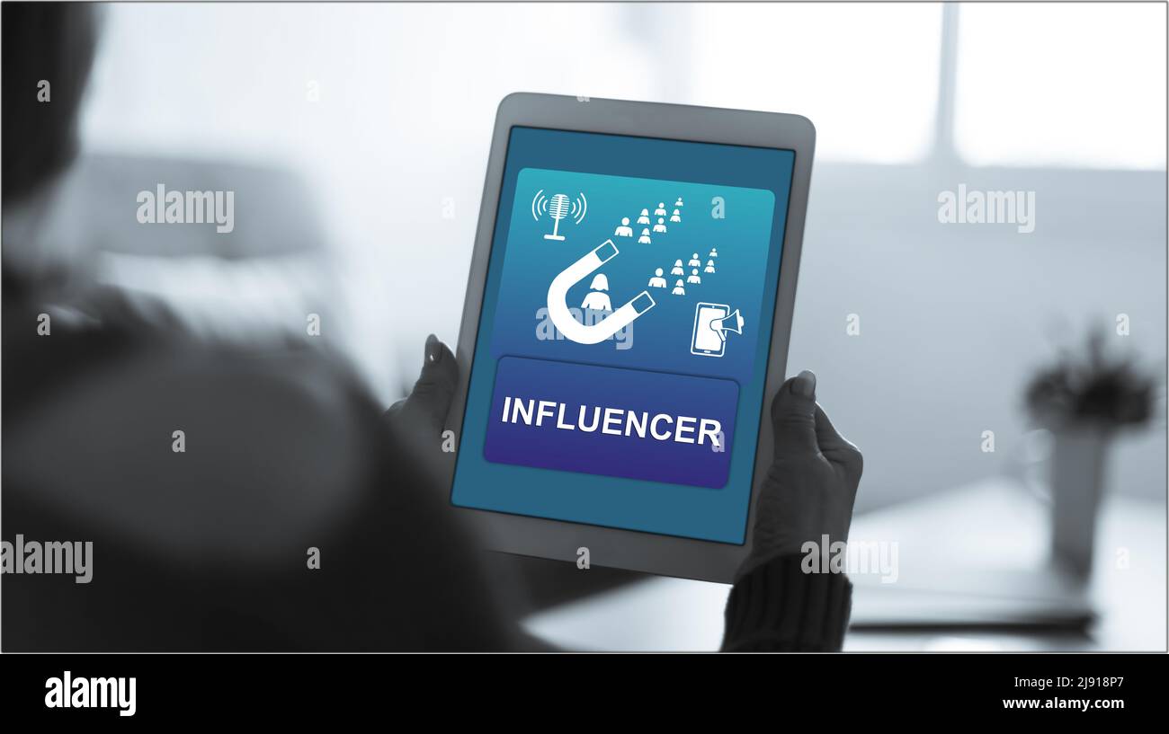 Tablet screen displaying an influencer concept Stock Photo - Alamy