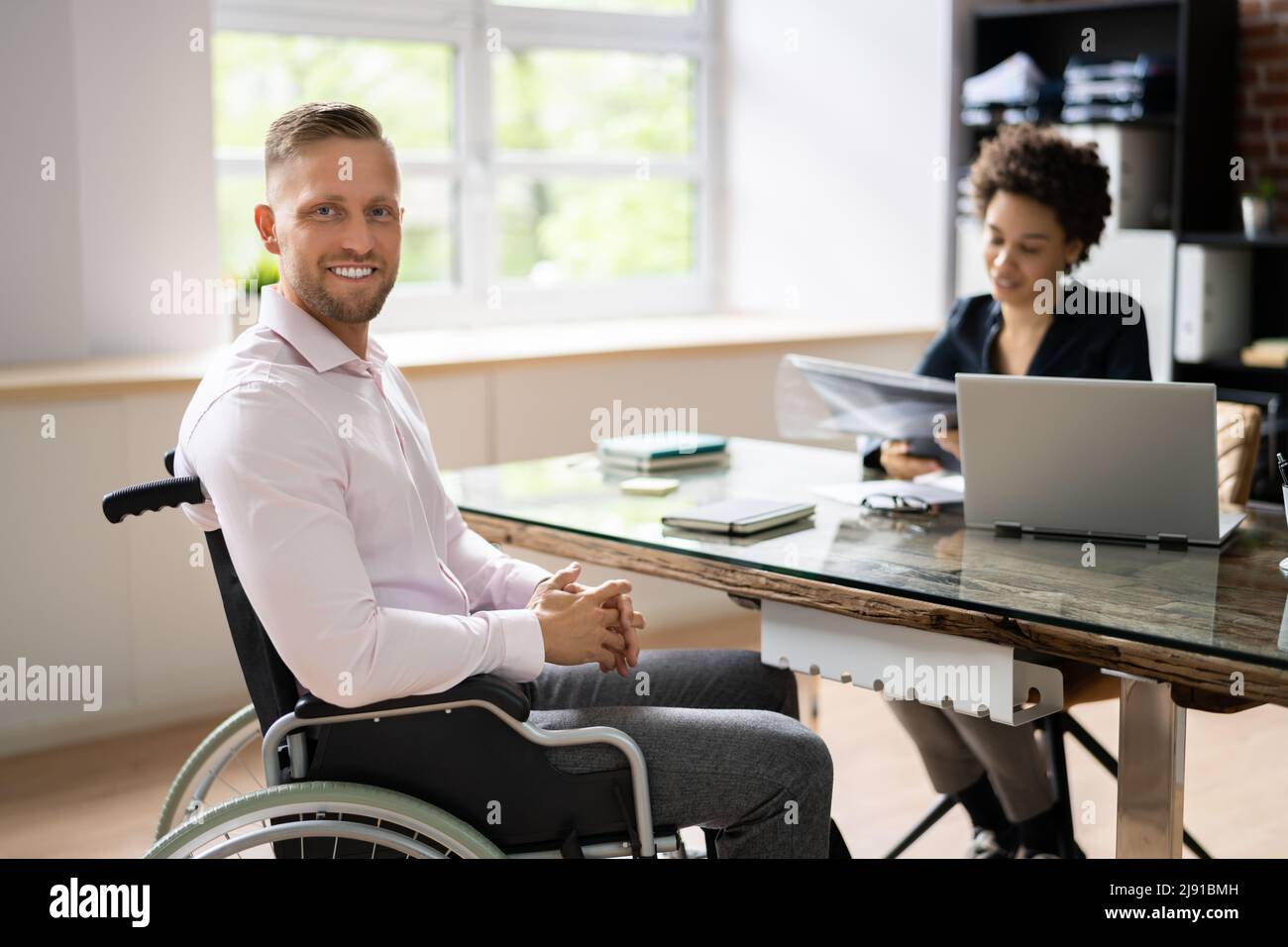 Happy african american office worker hi-res stock photography and ...