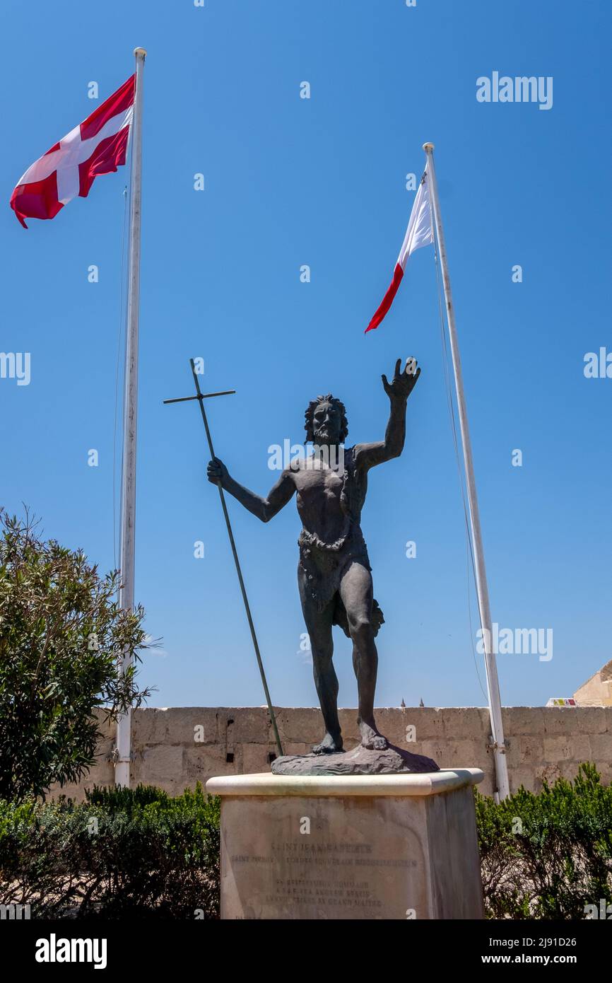 Statue of St John the Baptist and Maltese flags, Fort St Angelo ...