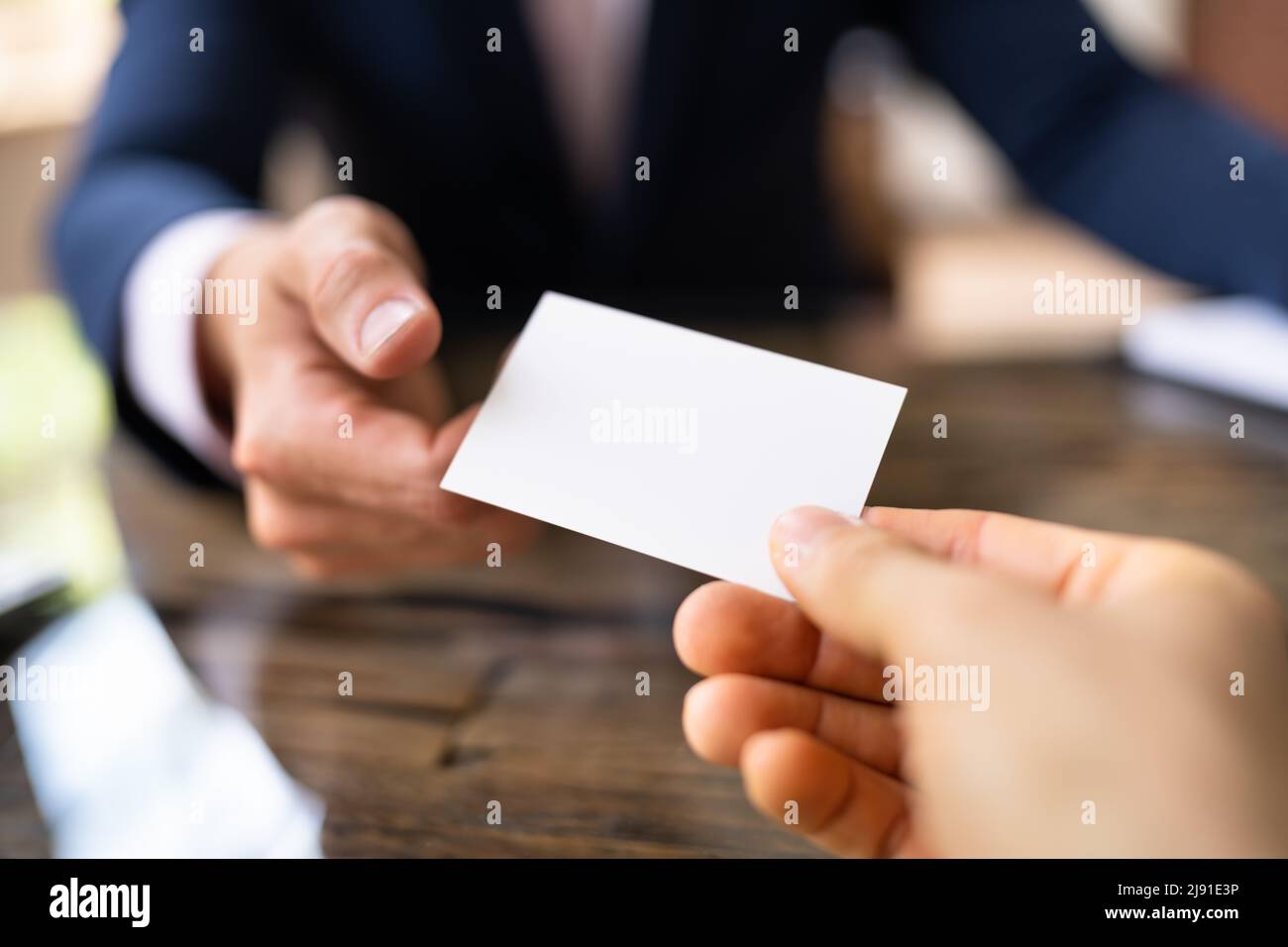 Business Card Exchange. Holding Visiting Or Reference Card Stock Photo ...