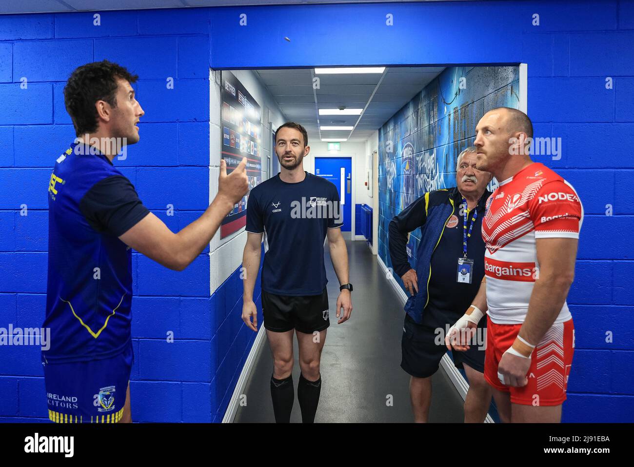 Stefan Ratchford #1 of Warrington Wolves flips the coin as referee ...