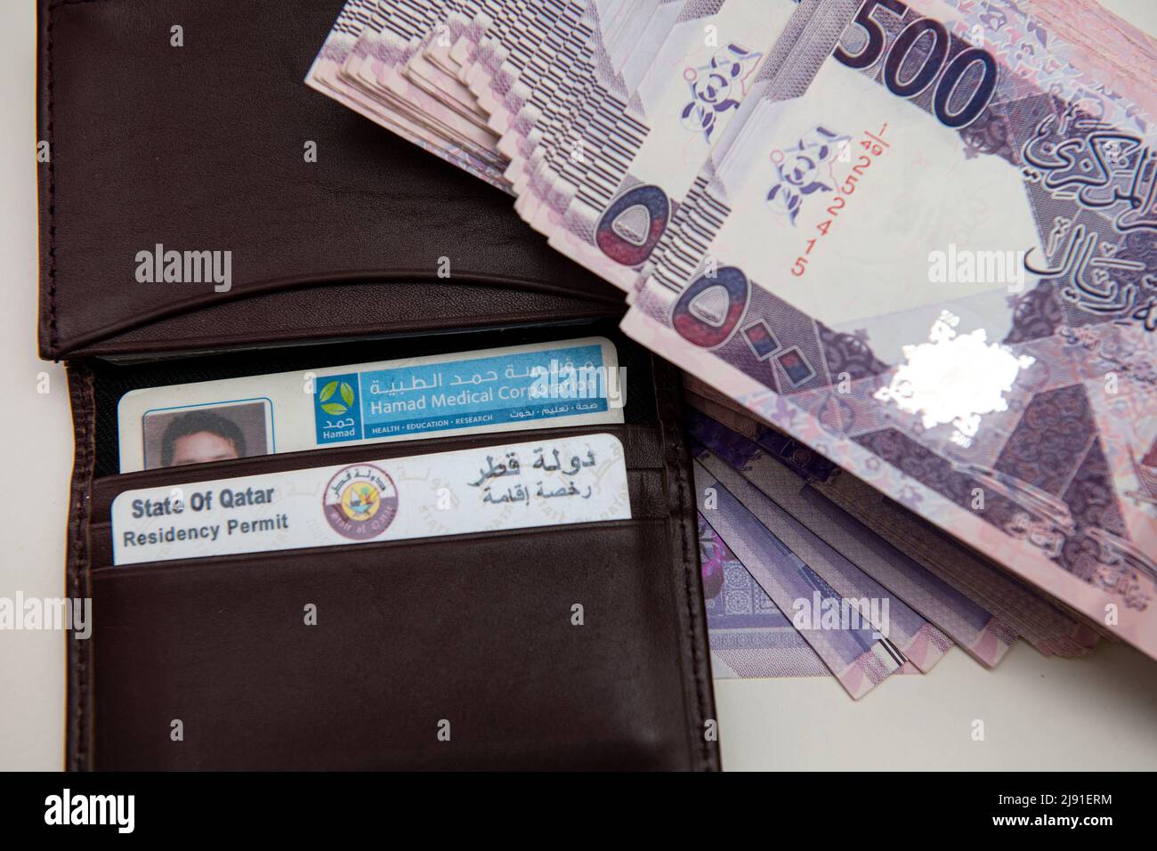 Qatar Bank Note 500 Riyal with Health card and Residence card on ...