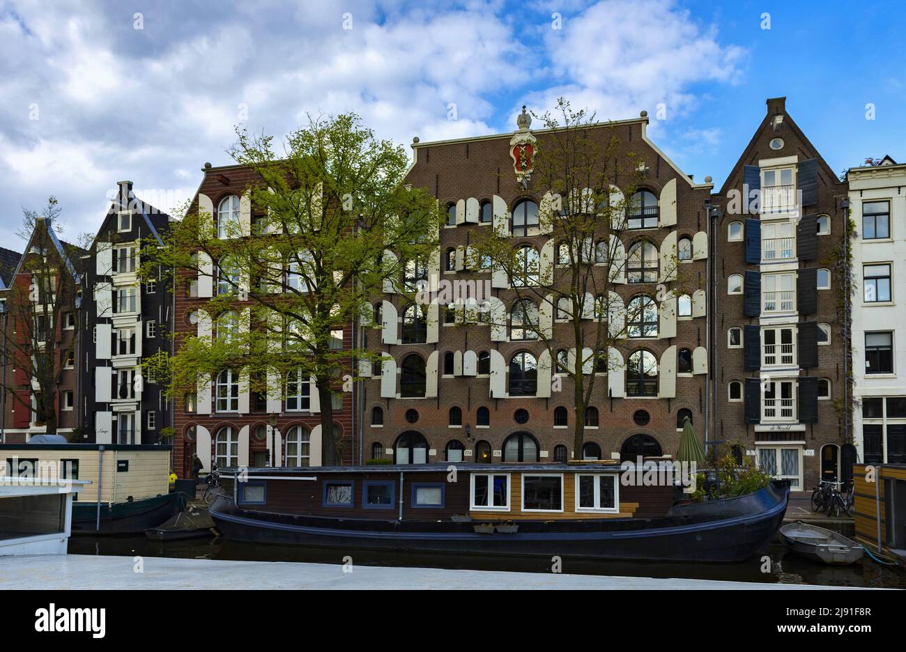 Red brick house in Amsterdam Stock Photo - Alamy