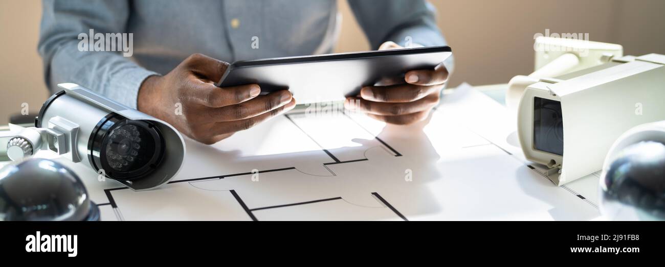 CCTV Security Alarm And Fire Surveillance On Tablet Stock Photo - Alamy