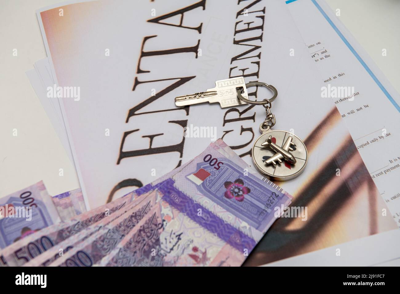 Property rental agreement for filing in and keys with Qatar Bank Note ...