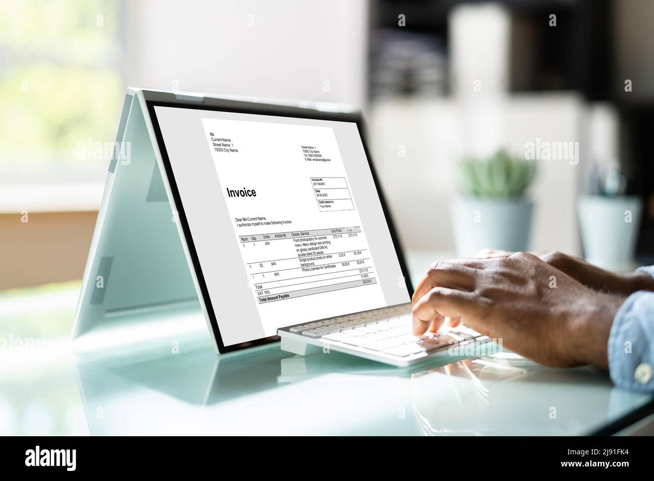 Young Businessman Using Laptop With Computer Screen Showing Invoice ...