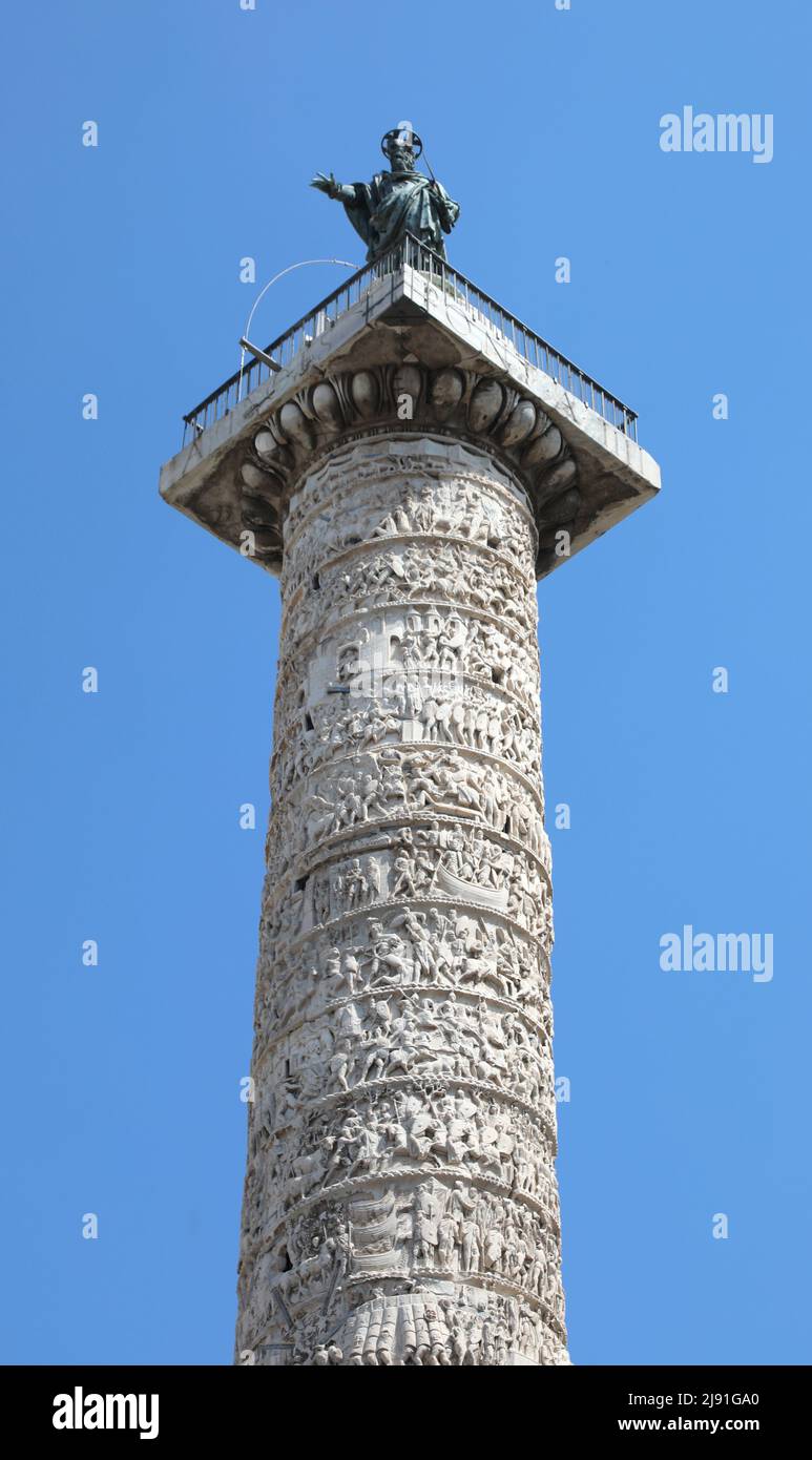 Very Ancient Roman column with a high relief depicting battle and war ...