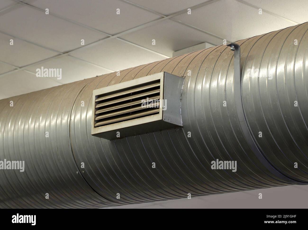 hot or cold air outlet in a large pipe of the air conditioning system ...