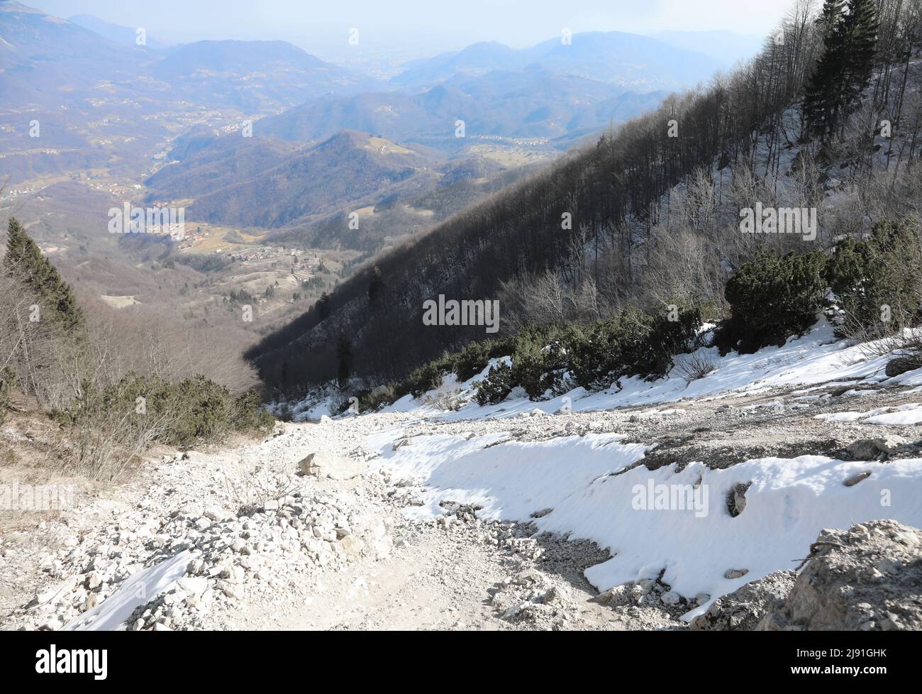 mountain gully full of stones after the landslide in winter and the ...