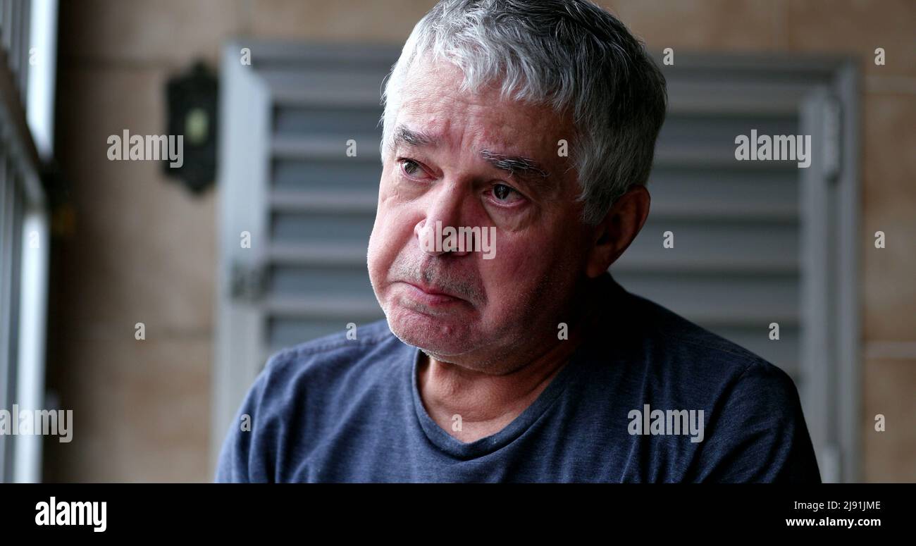 Sad emotional man wiping tears crying Stock Photo - Alamy