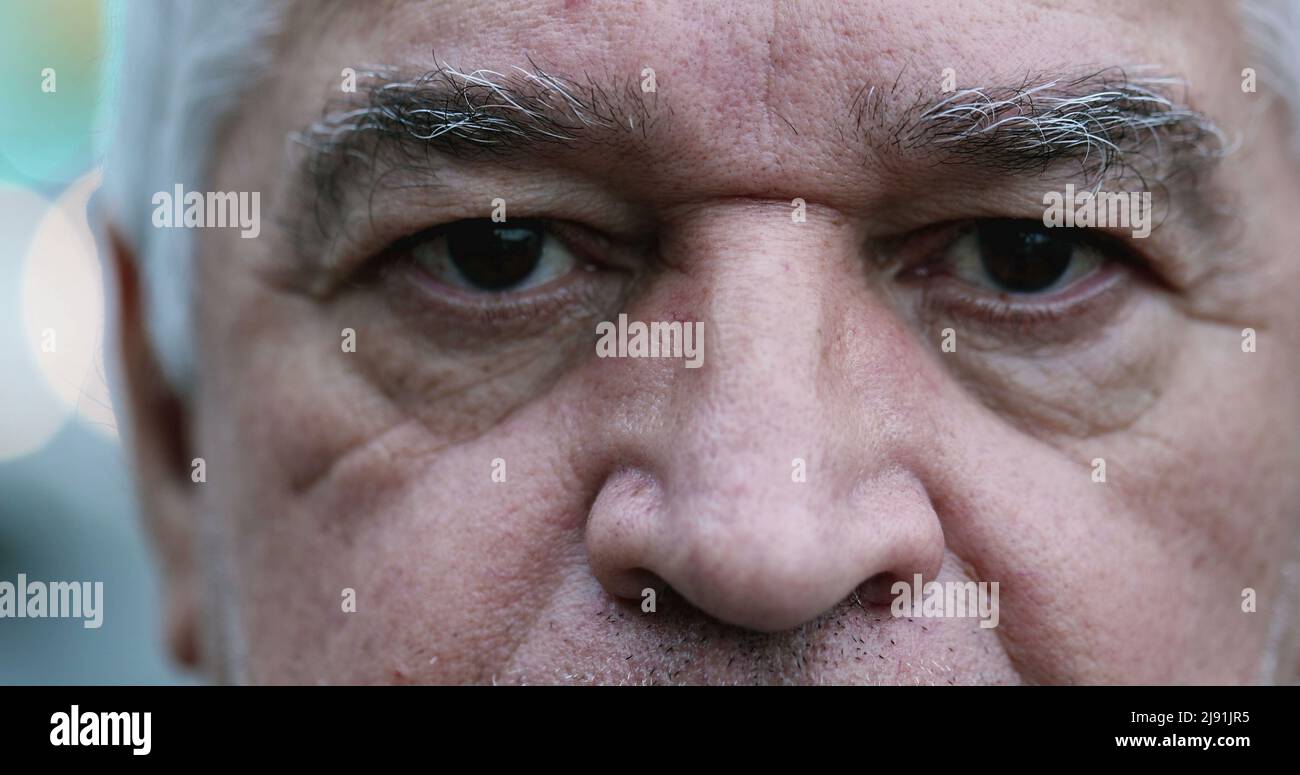 Serious Old wrinkled middle-aged man eyes close-up Stock Photo - Alamy