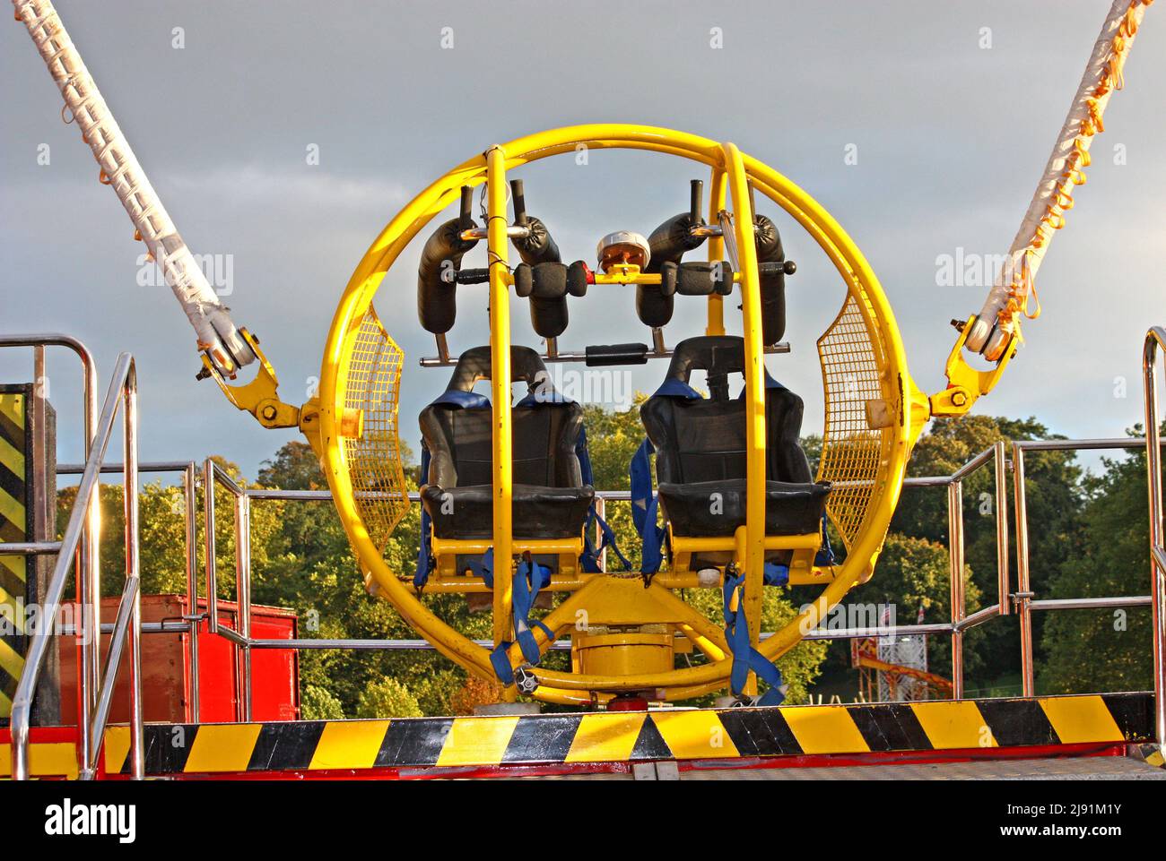 A Powerful High Flying Ride at a Fun Fair Stock Photo - Alamy