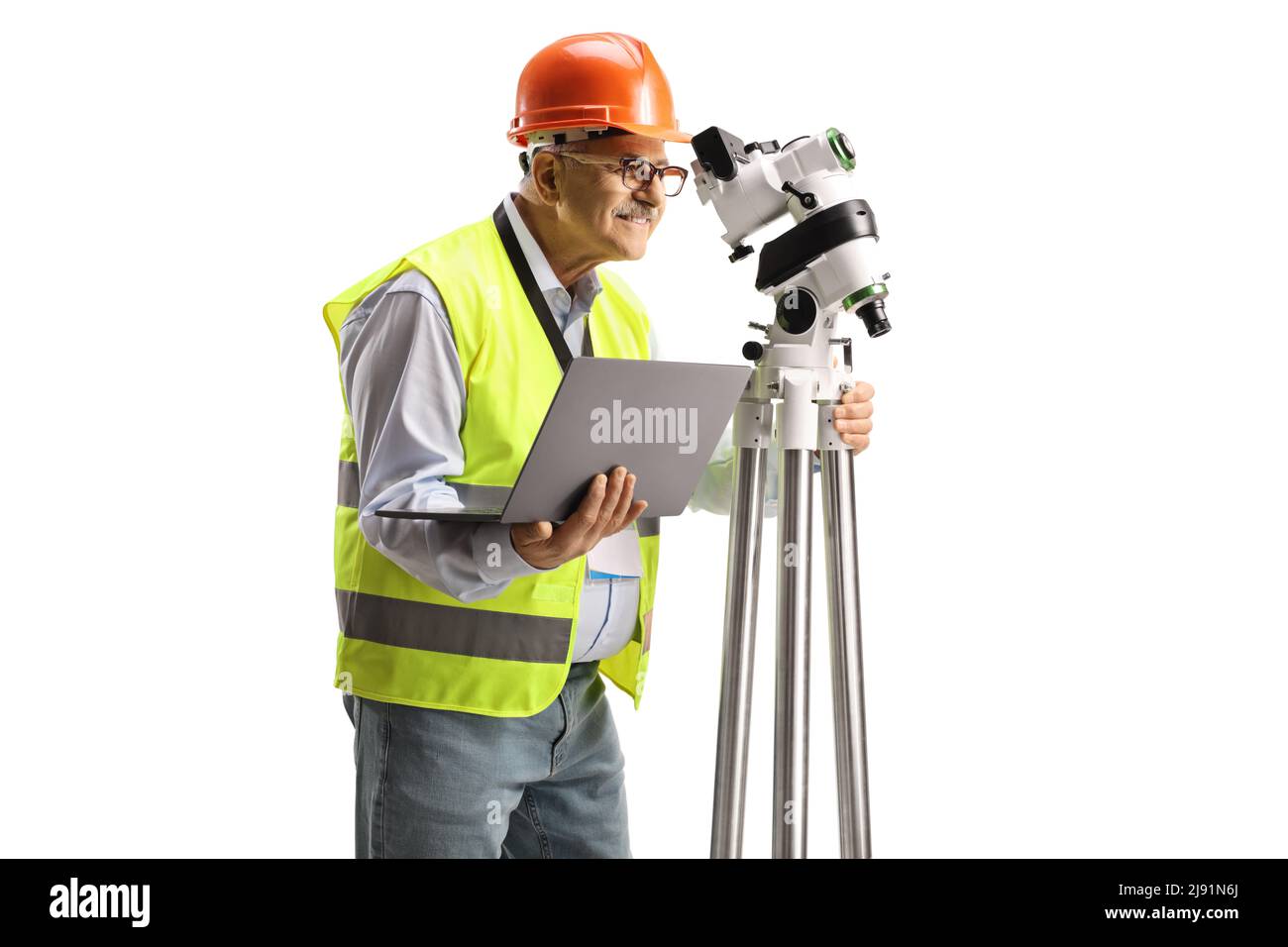 Geodetic surveyor measuring with a positioning station and holding a ...
