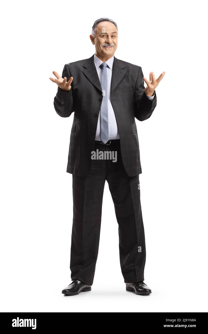 Mature man in a black suit and tie explaining something with hands ...