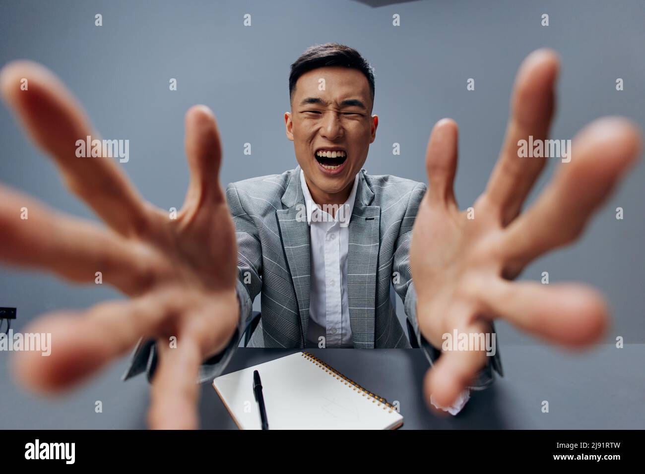 worker sits in the office emotions nervous breakdown anger isolated ...