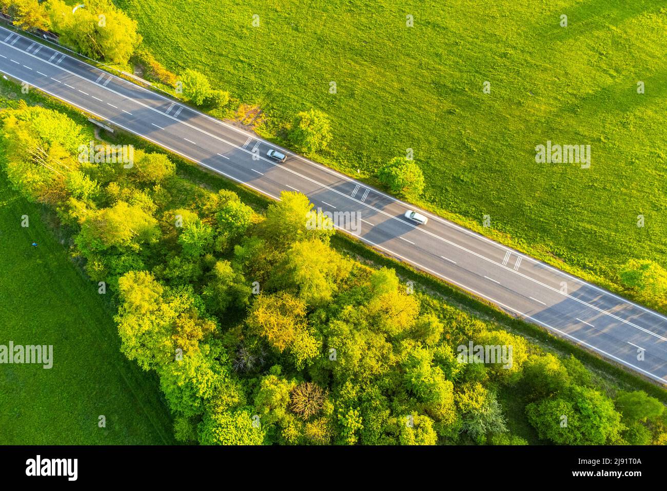 Straight asphalt road from above Stock Photo - Alamy