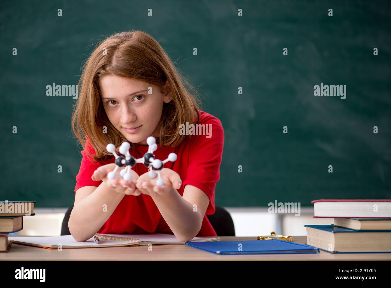 Female student chemist preparing for exams in the classroom Stock Photo ...