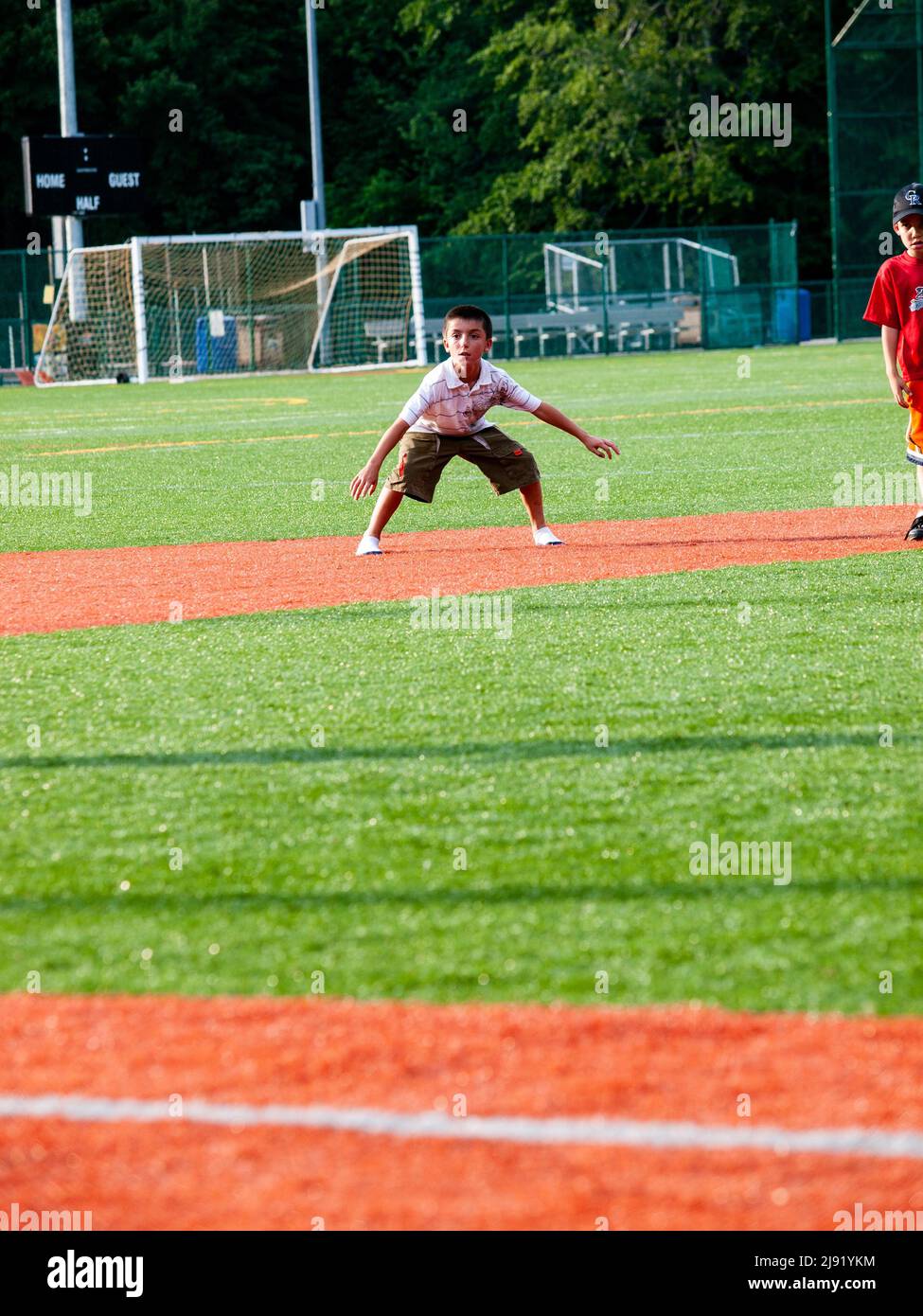Children's baseball game Stock Photo - Alamy