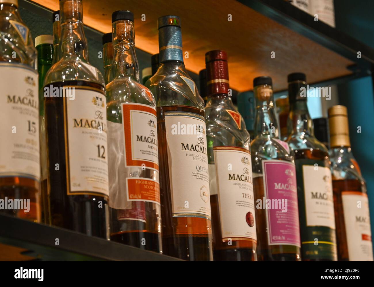 Assortment of whiskey on display Stock Photo - Alamy