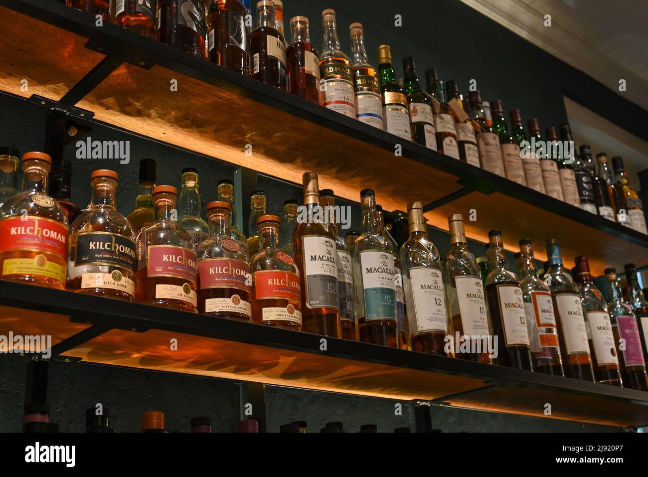 Assortment of whiskey on display Stock Photo - Alamy