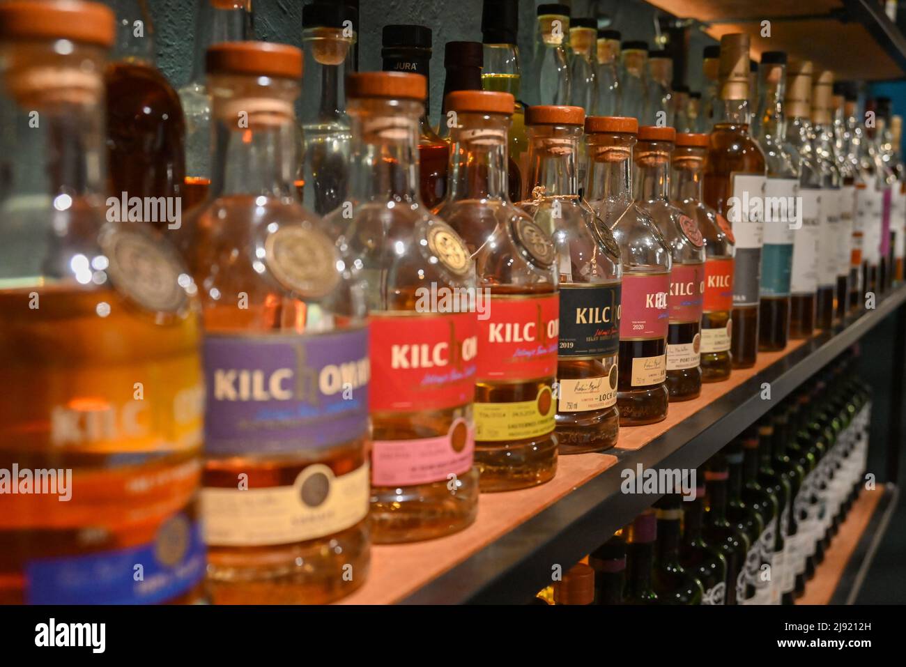 Assortment of whiskey on display Stock Photo - Alamy