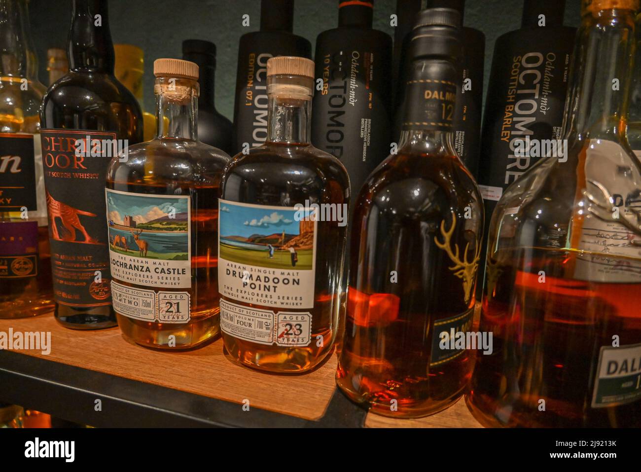 Assortment of whiskey on display Stock Photo - Alamy