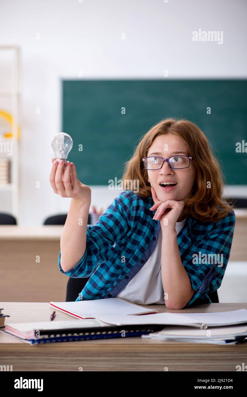 Female student in happy idea concept Stock Photo - Alamy