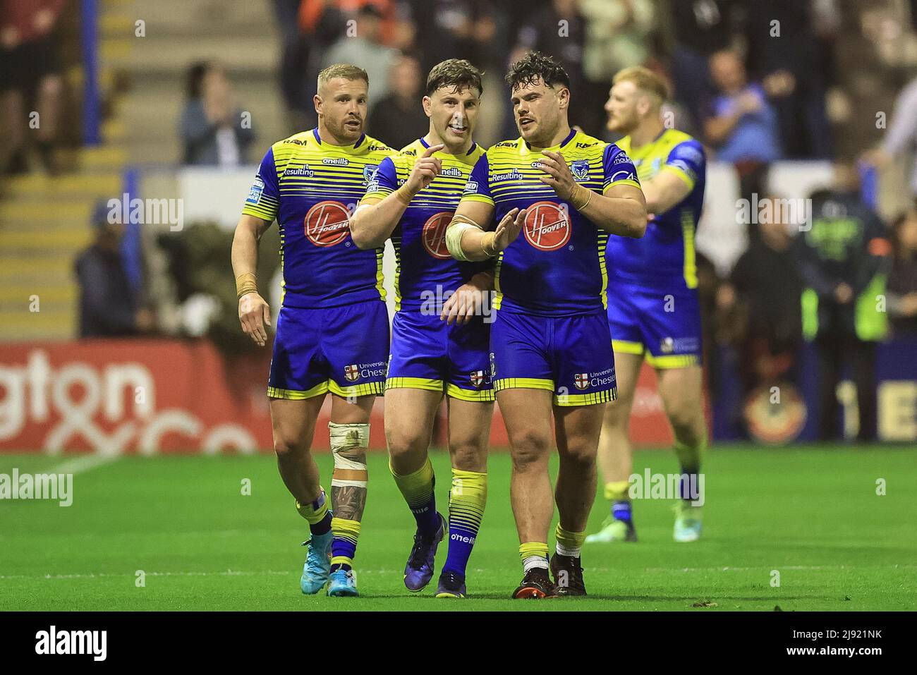 Oliver Holmes #12 of Warrington Wolves, George Williams #7 of ...