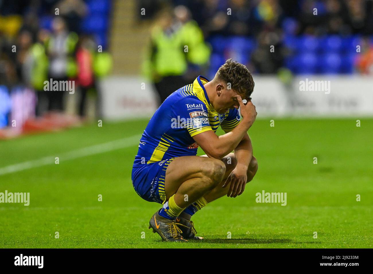 Matty Ashton #5 of Warrington Wolves is dejected at the final whistle ...
