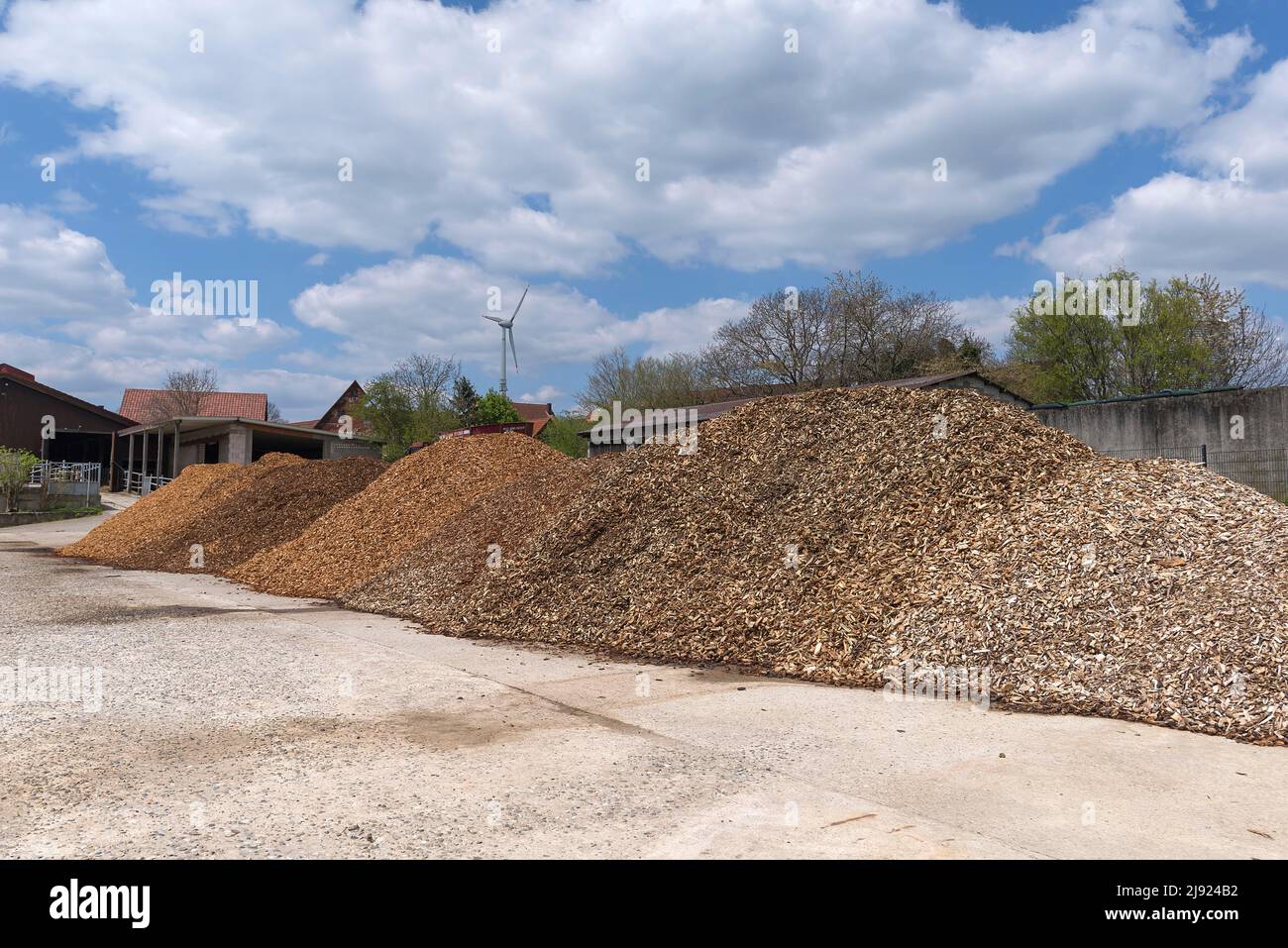 Storage of bark mulch on a farm, Bavaria, Germany Stock Photo - Alamy