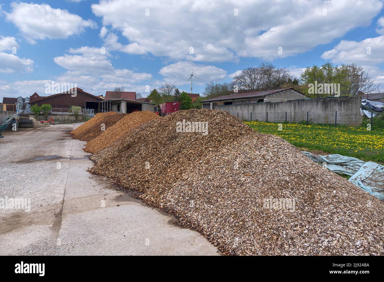 Storage of bark mulch on a farm, Bavaria, Germany Stock Photo - Alamy