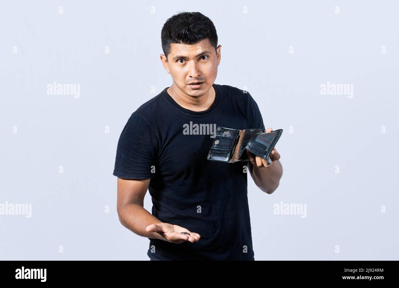 Sad man holding empty wallet and looking at the camera, Unhappy and ...